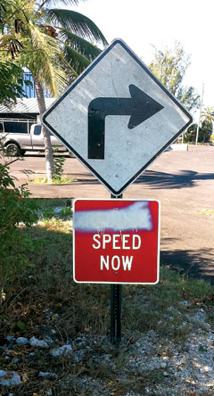 Signs defaced on Cayman Brac - Cayman Compass