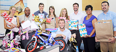 Deloitte helps out at Christmas - Cayman Compass
