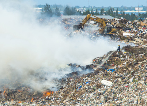 Response to dump fire under review - Cayman Compass