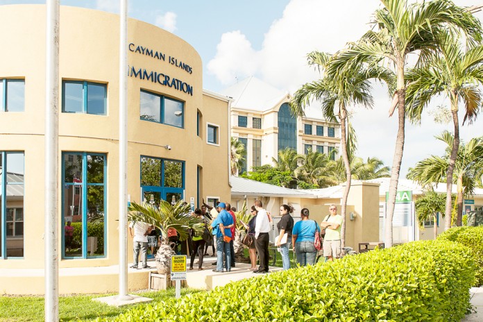 Cayman's permanent resident population drops 12 percent - Cayman Compass