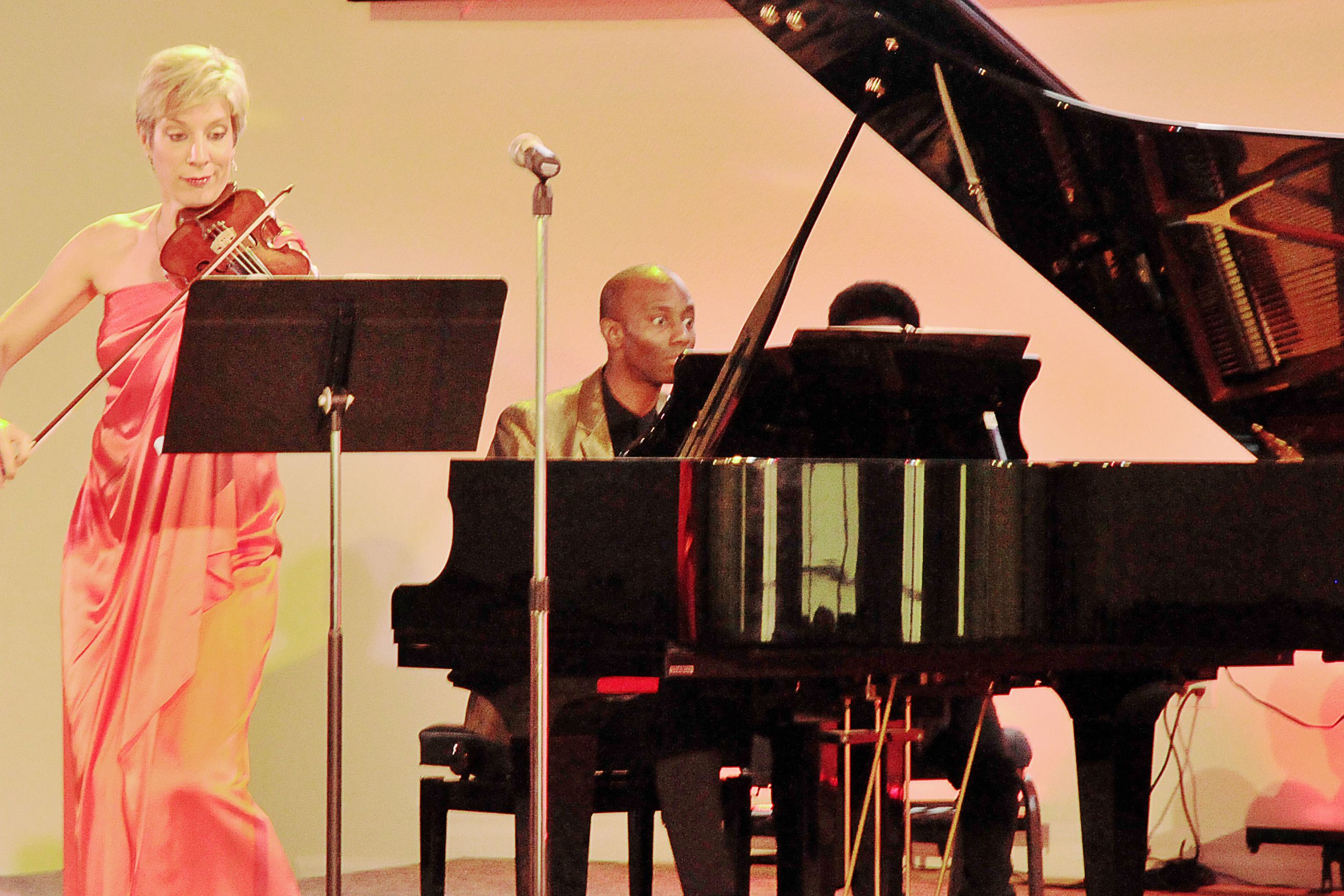 Elizabeth Pitcairn soars with red violin - Cayman Compass