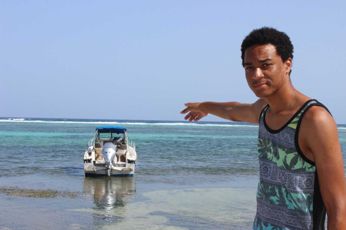 Teenager helps save two people from drowning - Cayman Compass