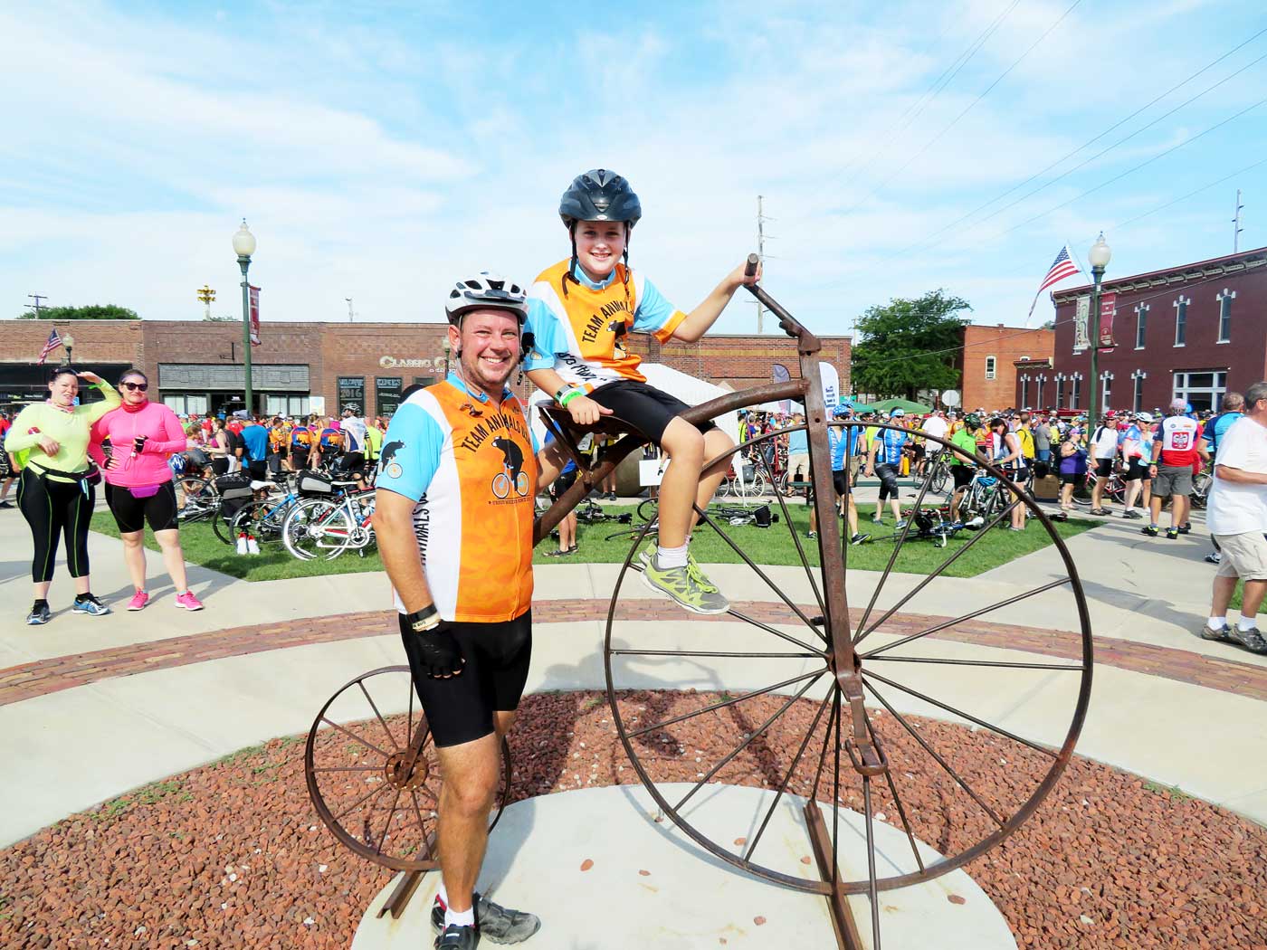 Father and son cycle for Cayman charities - Cayman Compass