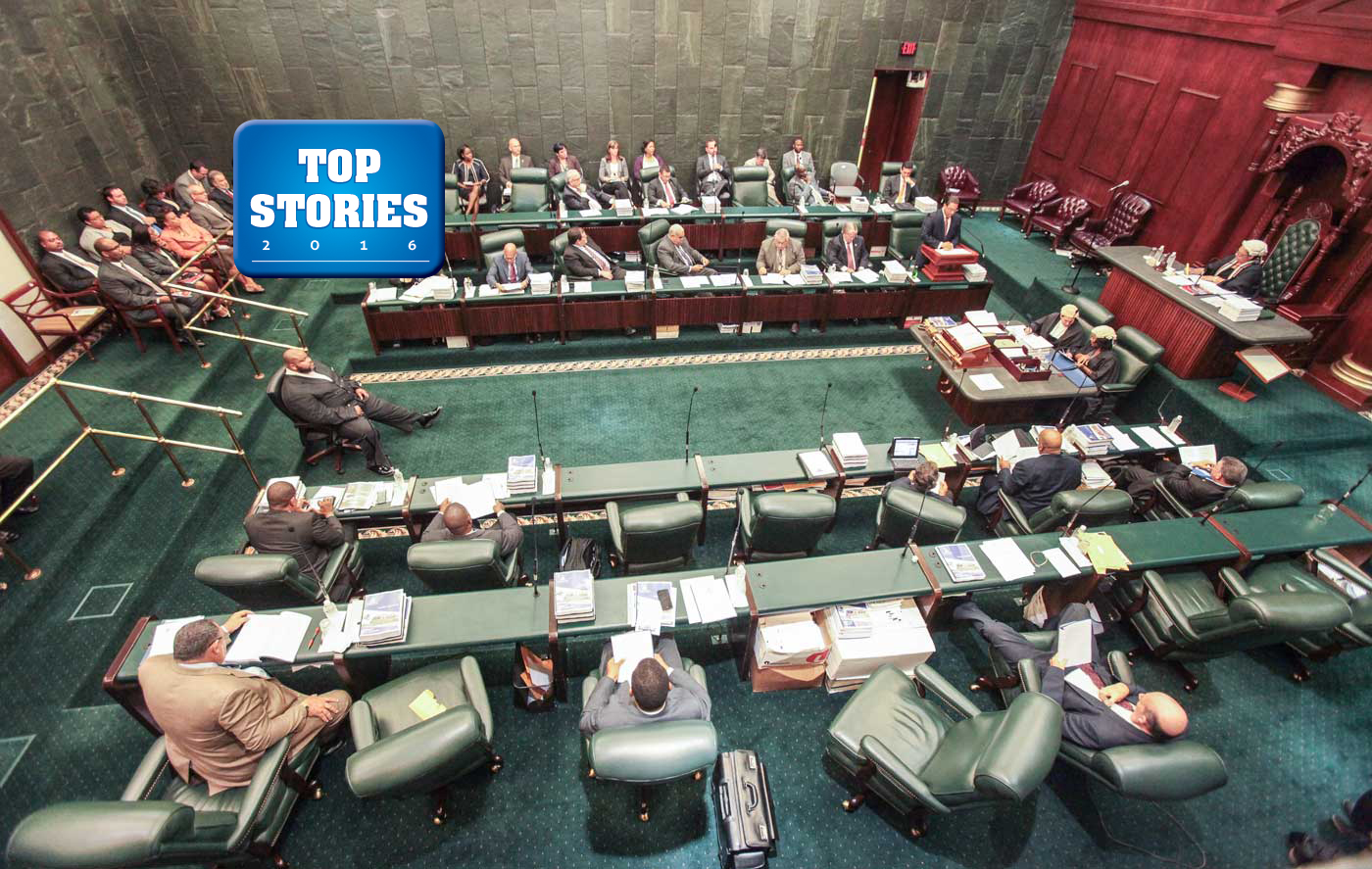 Three defections leave bare bones ruling government - Cayman Compass