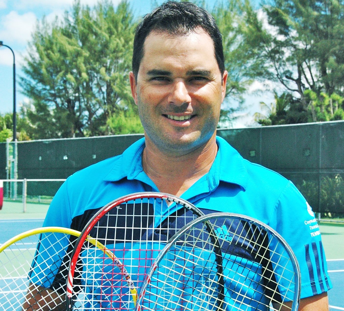 International tennis player coaches primary students - Cayman Compass