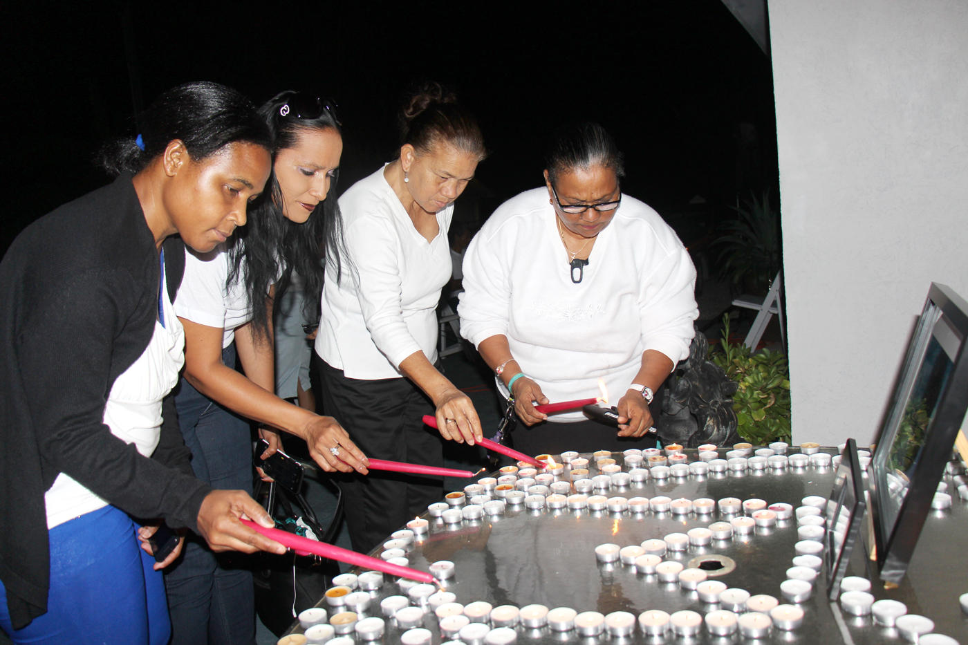 West Bay shooting victim remembered at candlelight vigil - Cayman Compass