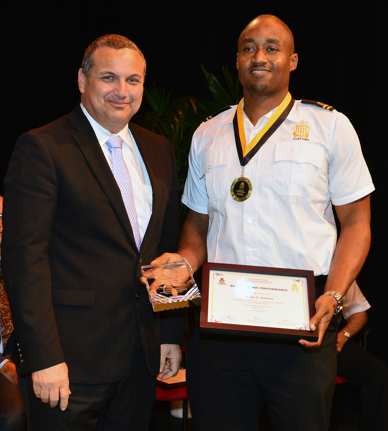 Fourteen Customs officers complete training - Cayman Compass