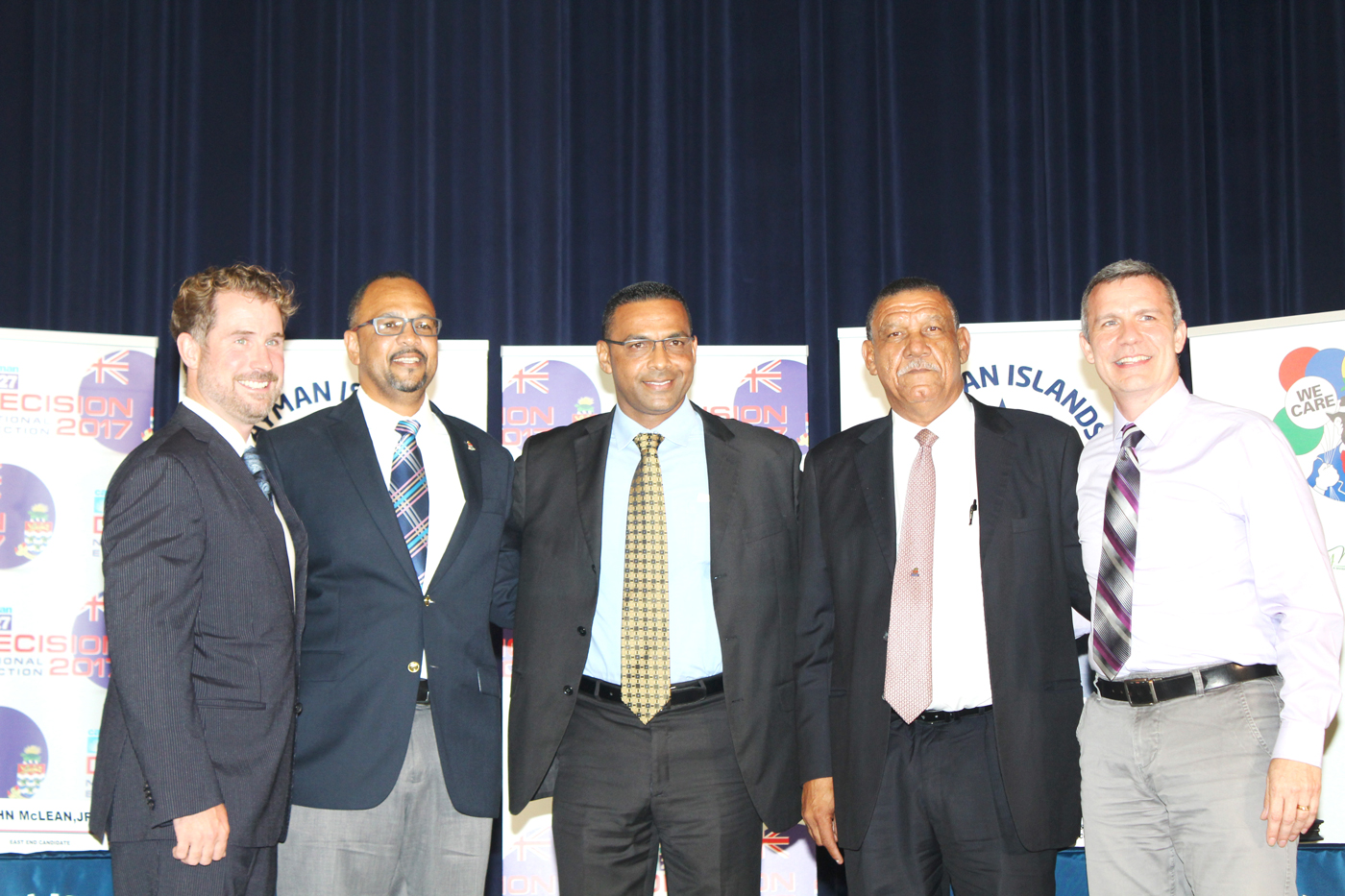EE candidates kick off election debates - Cayman Compass