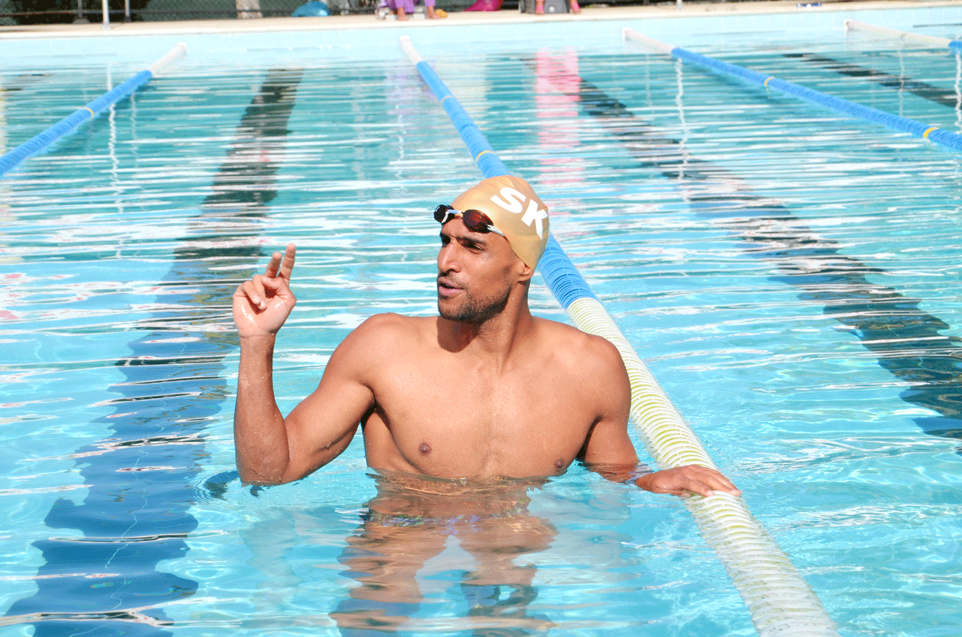 Olympian visits Stingray Swim Club - Cayman Compass