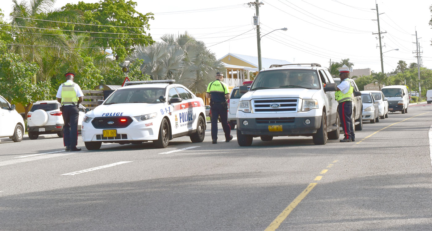 Police carrying out roadside checks - Cayman Compass