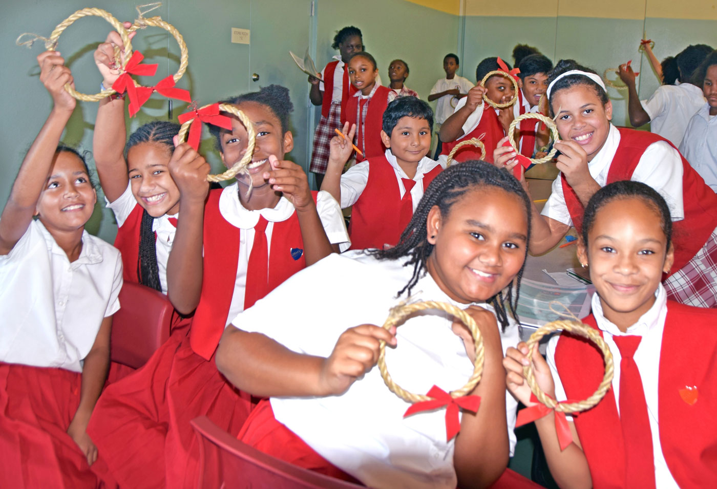 Wreathed in smiles - Cayman Compass