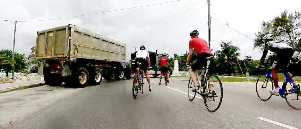 bikes-vs-truck - Cayman Compass