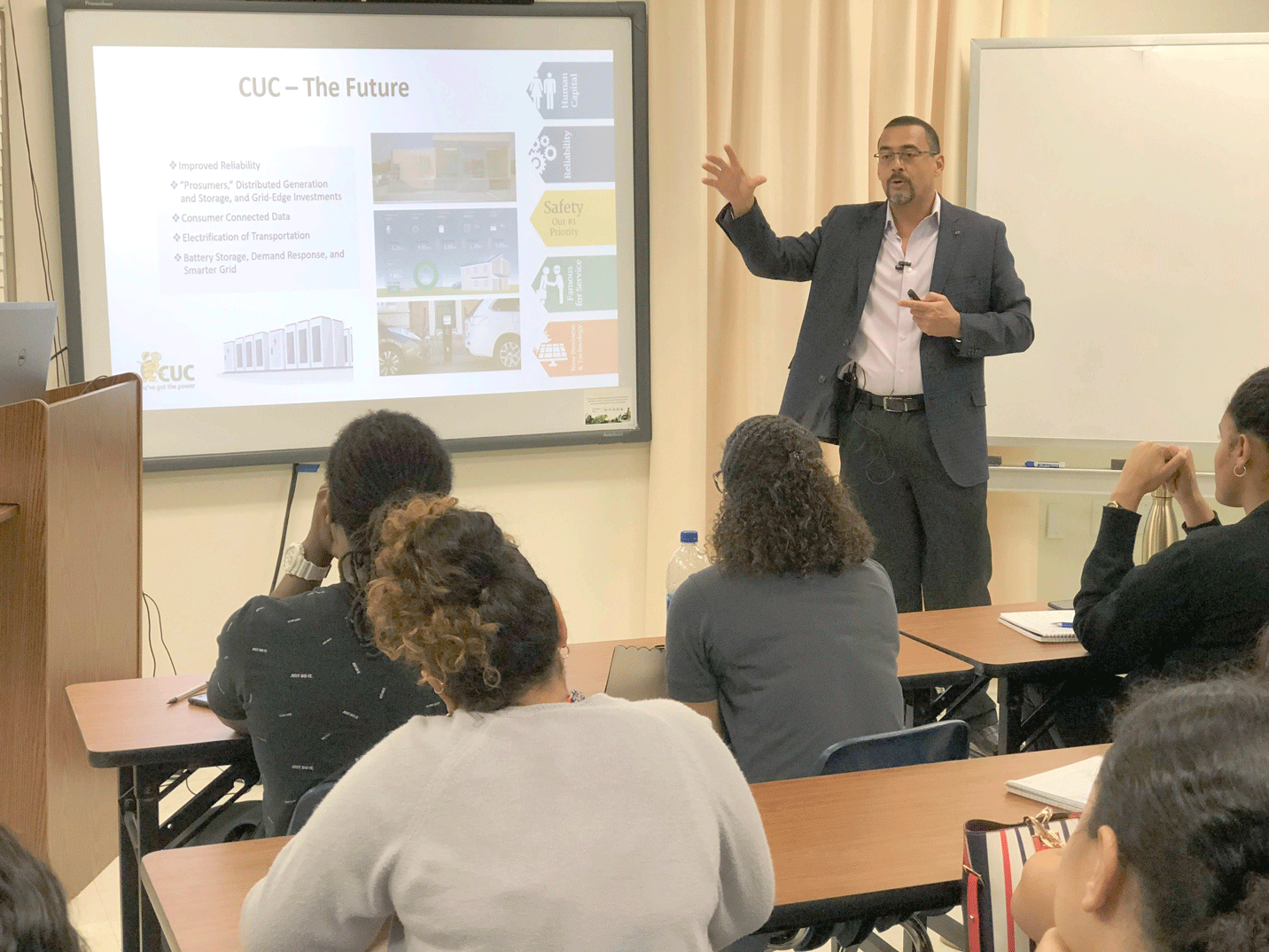 CUC chief executive speaks to ICCI students - Cayman Compass