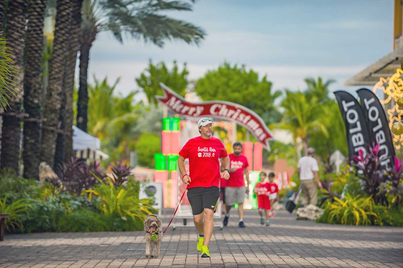 In Focus: Festive parade of Santas - Cayman Compass