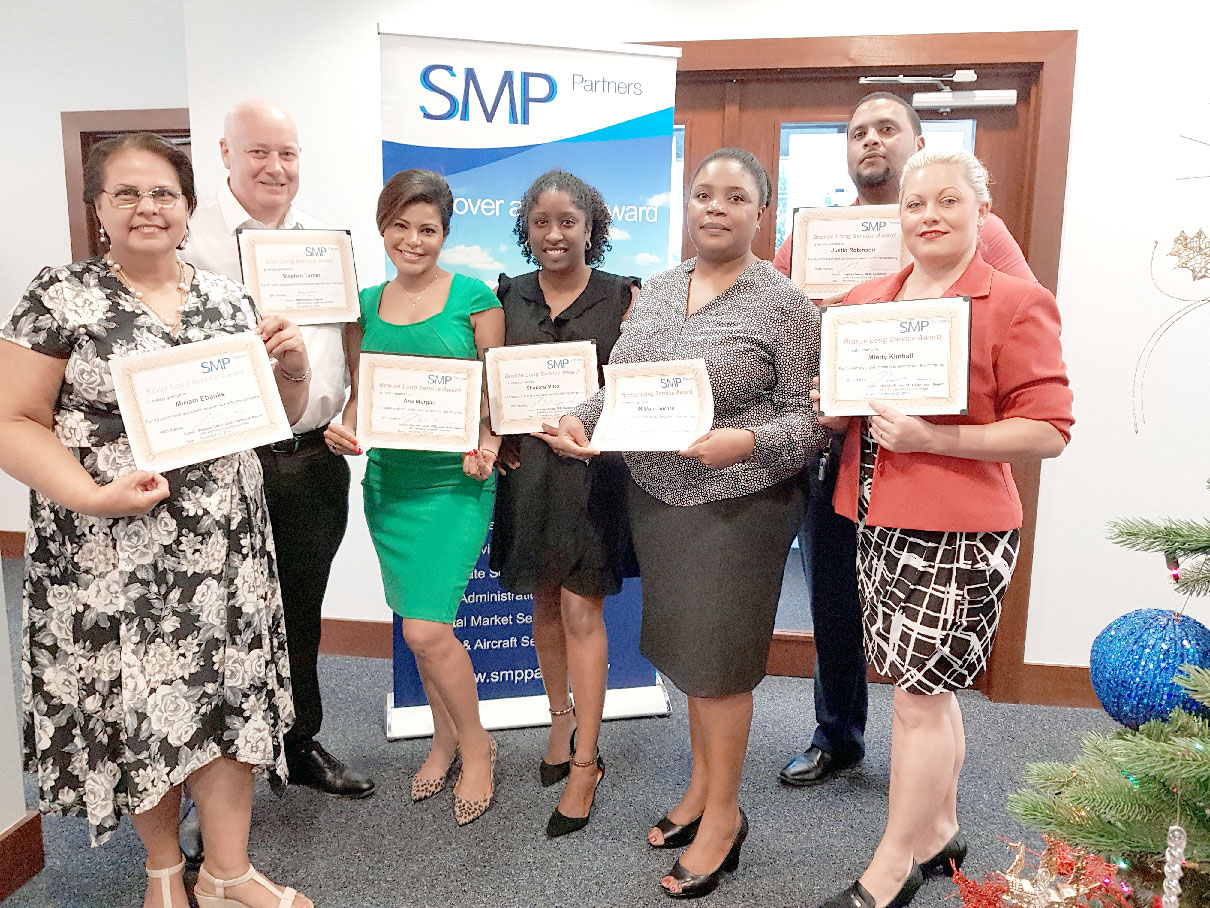 SMP Partners honors Cayman staff in annual awards - Cayman Compass