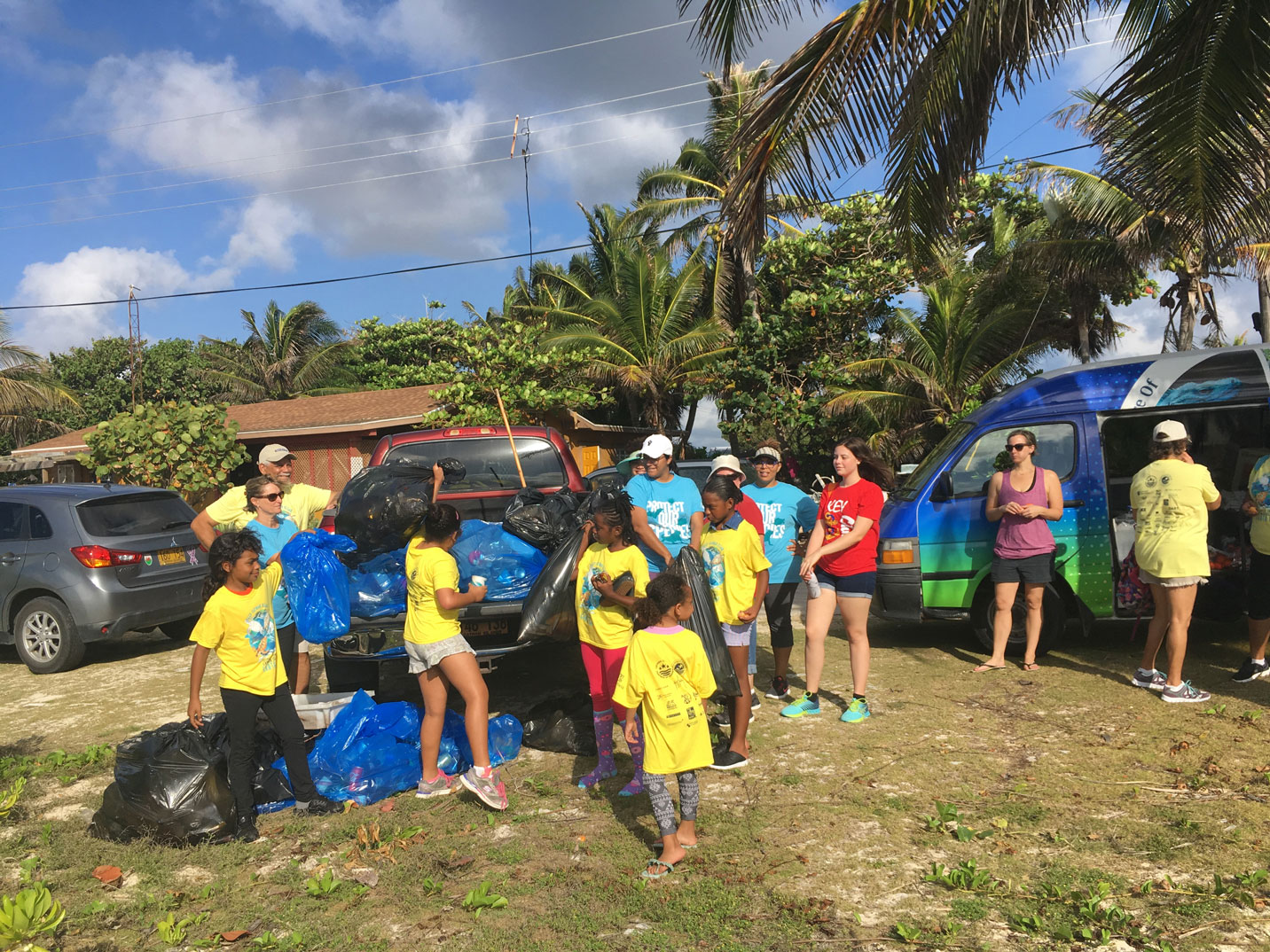 Cayman cleans up for Earth Day - Cayman Compass