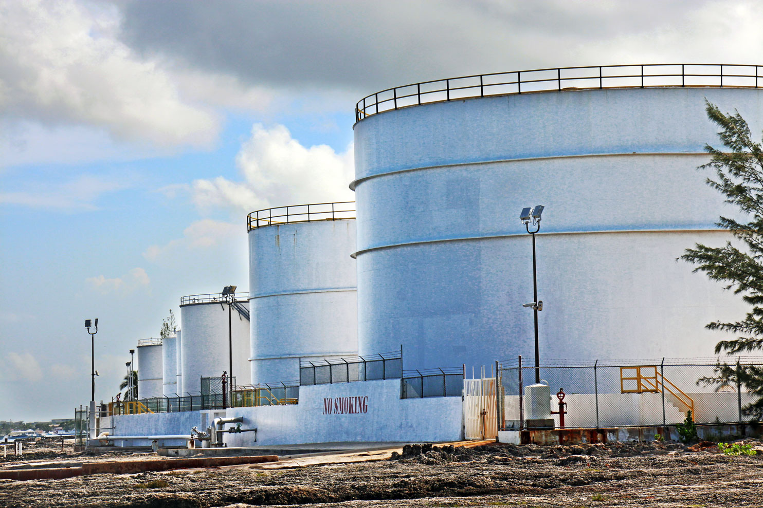 Clean-up work continues at historic oil spills - Cayman Compass