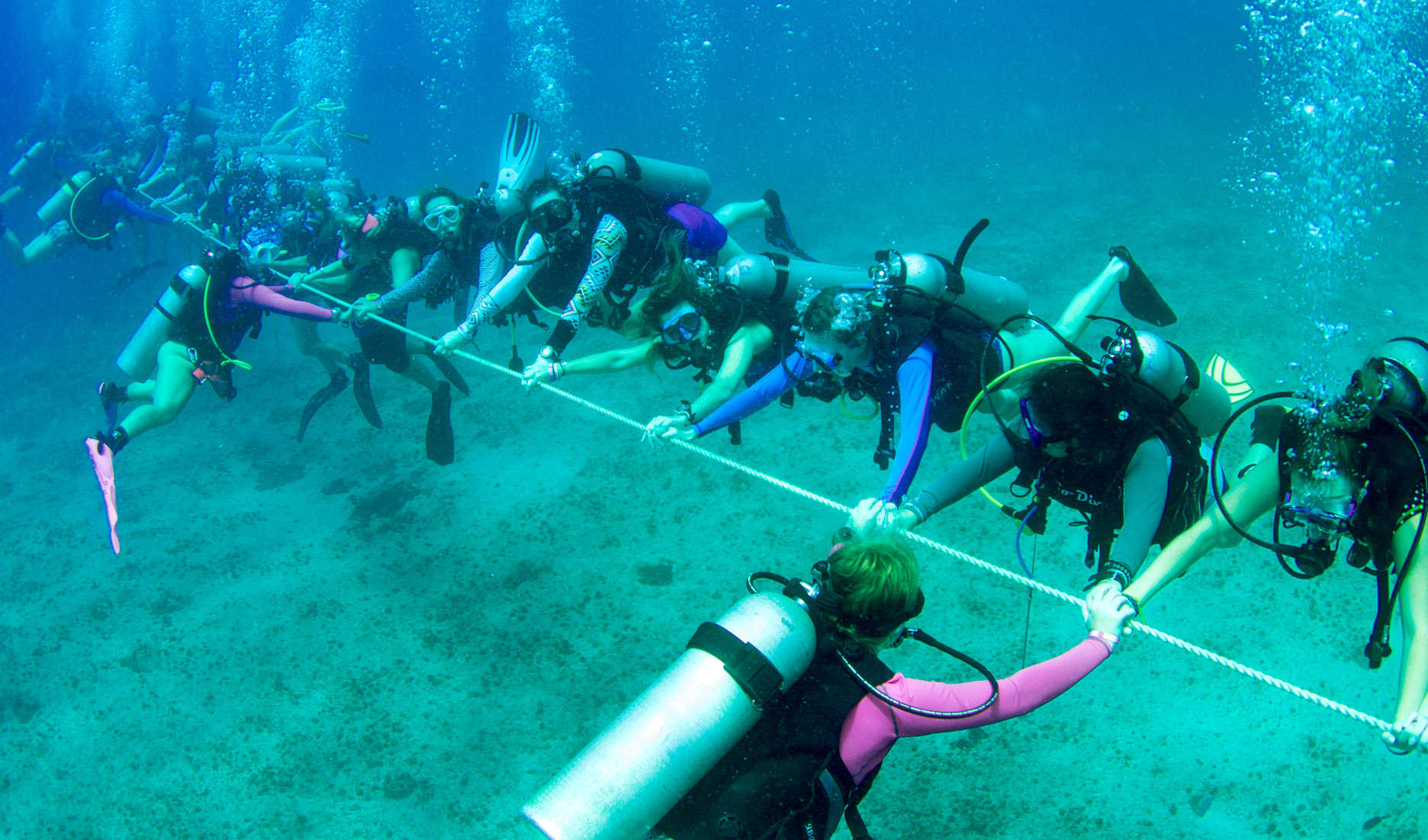 Female divers gear up for Women's Dive Day - Cayman Compass