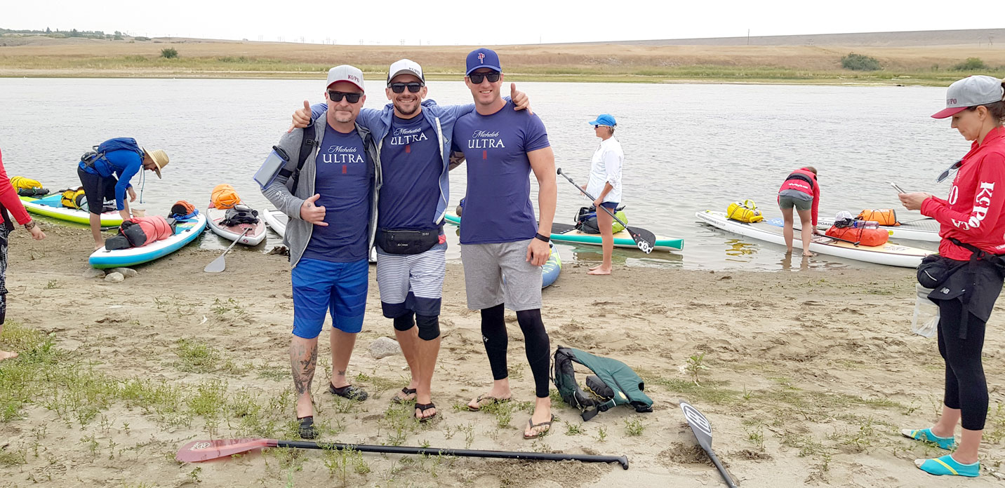 Paddleboard-team - Cayman Compass