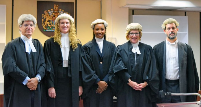 Walkers admits two new Caymanian attorneys - Cayman Compass