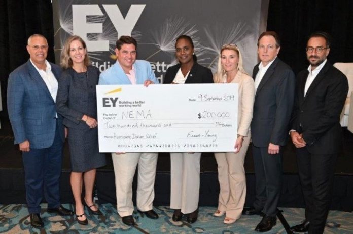 EY donates to hurricane relief - Cayman Compass