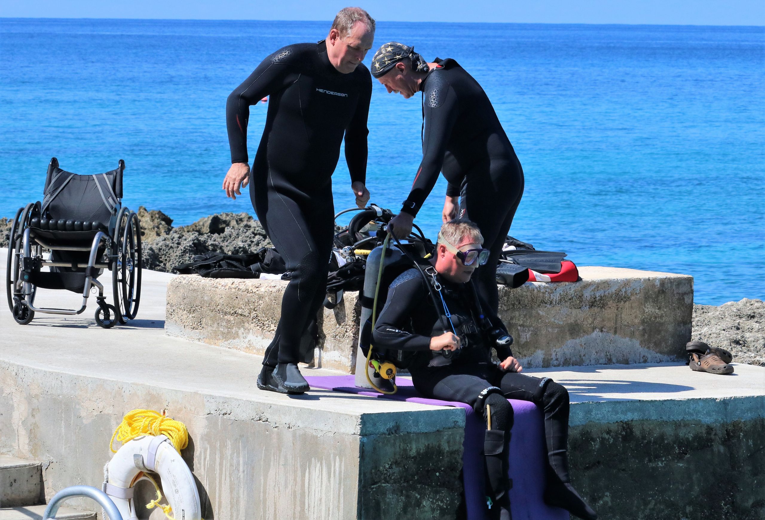 Instructors share knowledge on training disabled divers - Cayman Compass