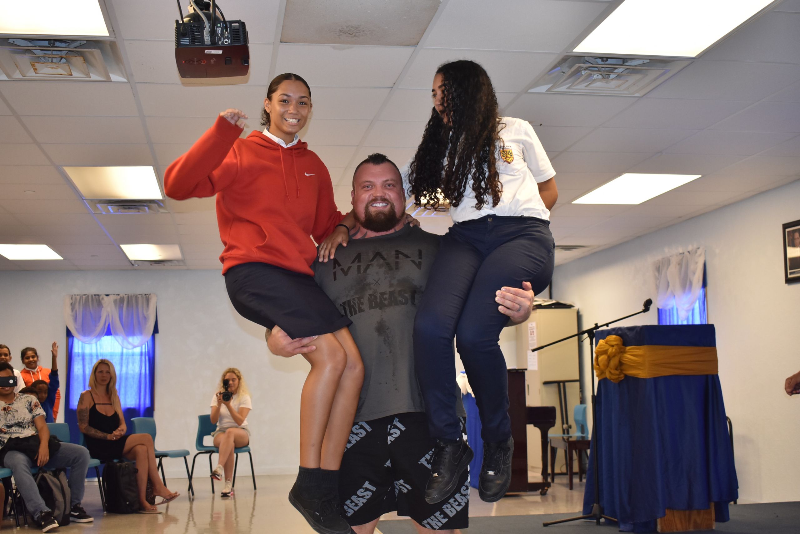 Flexing their muscles - Cayman Compass