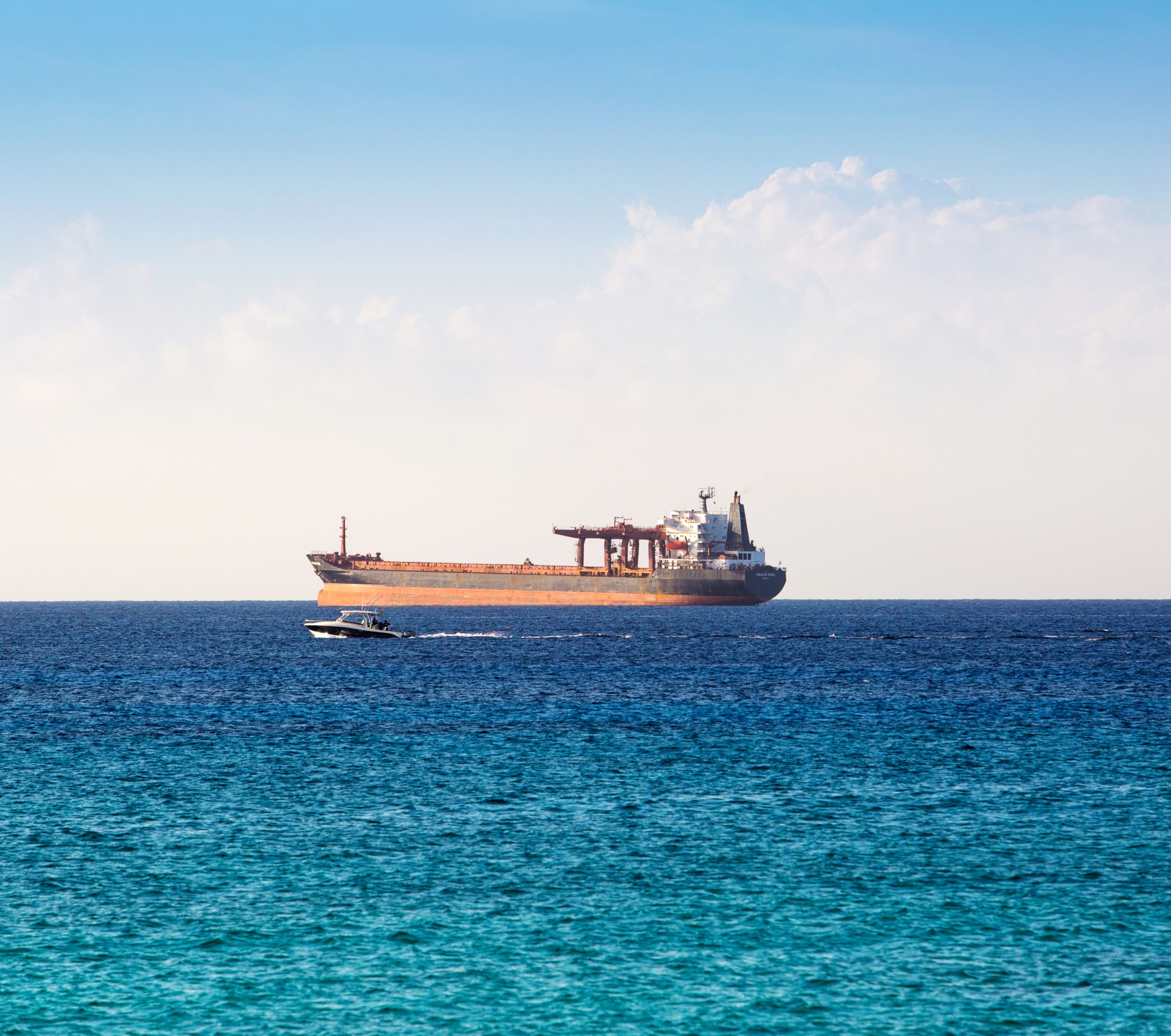 Massive cargo ship delivers aggregate for Cayman airport - Cayman Compass