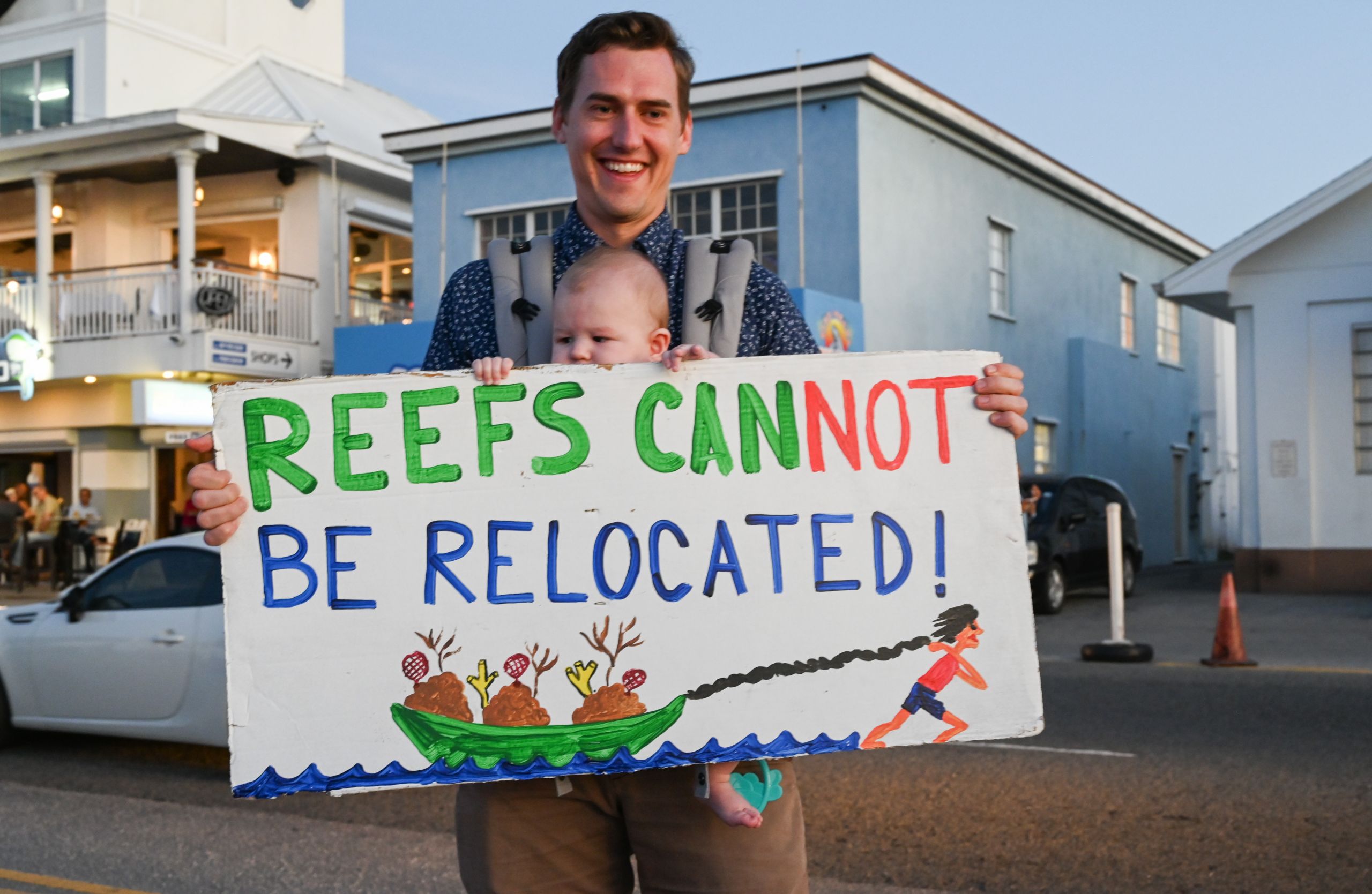 Environmental activists take port message to waterfront - Cayman Compass