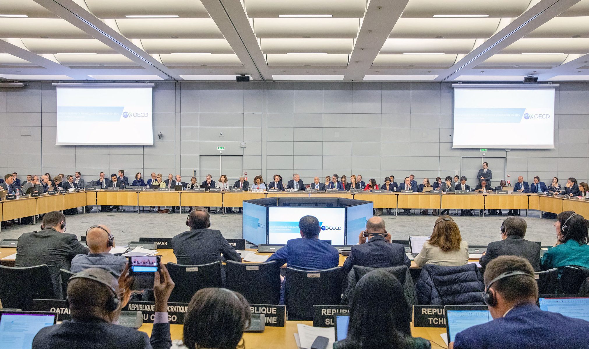 Global corporate tax reform could raise $100 billion annually - Cayman ...