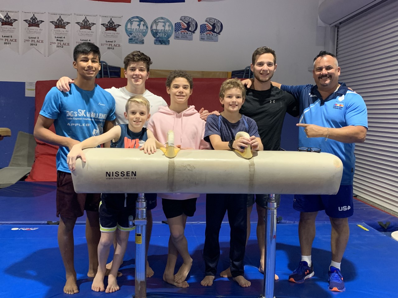 Olympic coach trains Cayman gymnasts - Cayman Compass