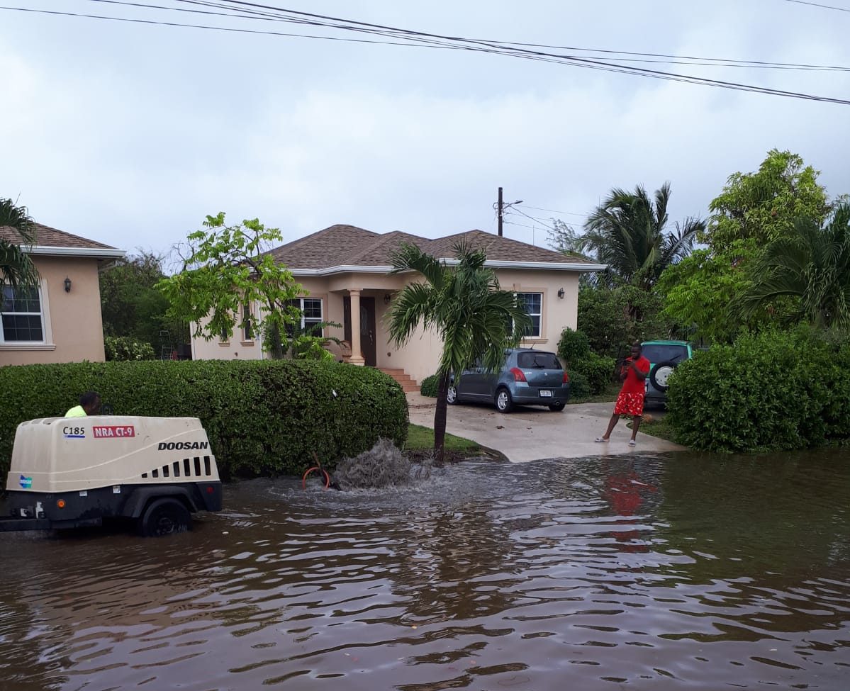 Heavy rains bring flood waters - Cayman Compass