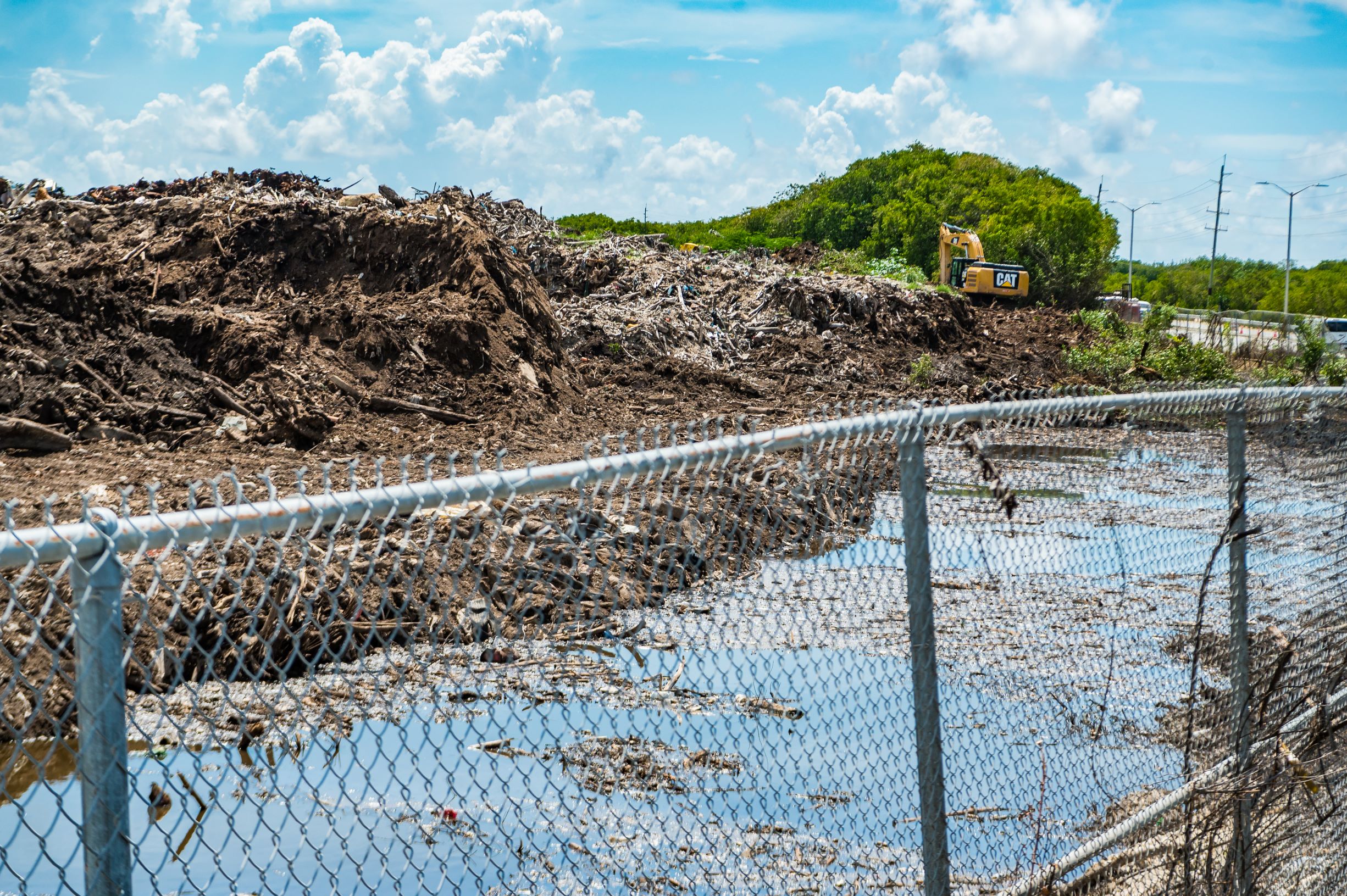 NRA carries out drainage work on edge of landfill - Cayman Compass