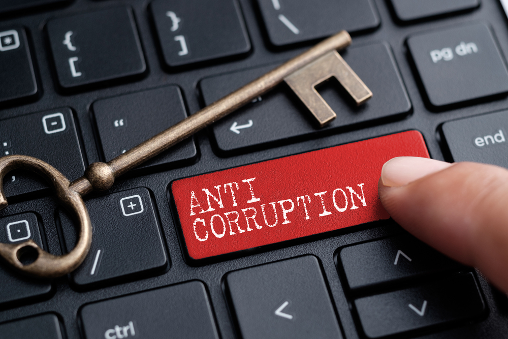 One arrested in anti-corruption probe - Cayman Compass
