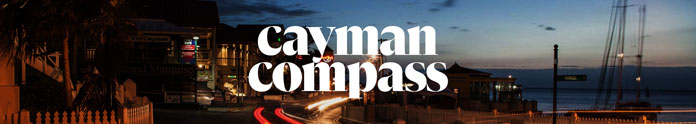 cayman-george-town-night-compass-logo-centre-696x124 - Cayman Compass