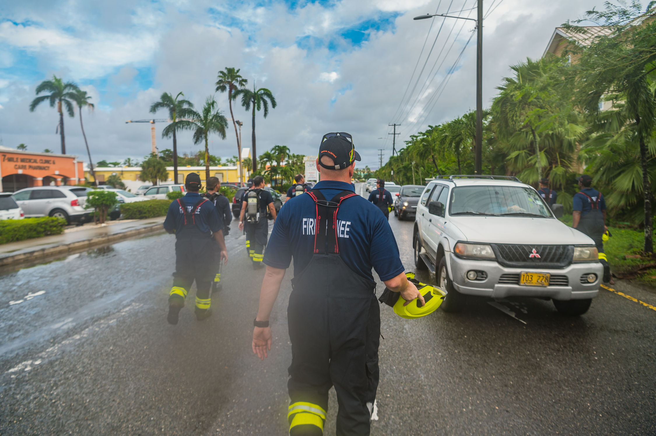 Firemen raise over $5K in inaugural walk - Cayman Compass