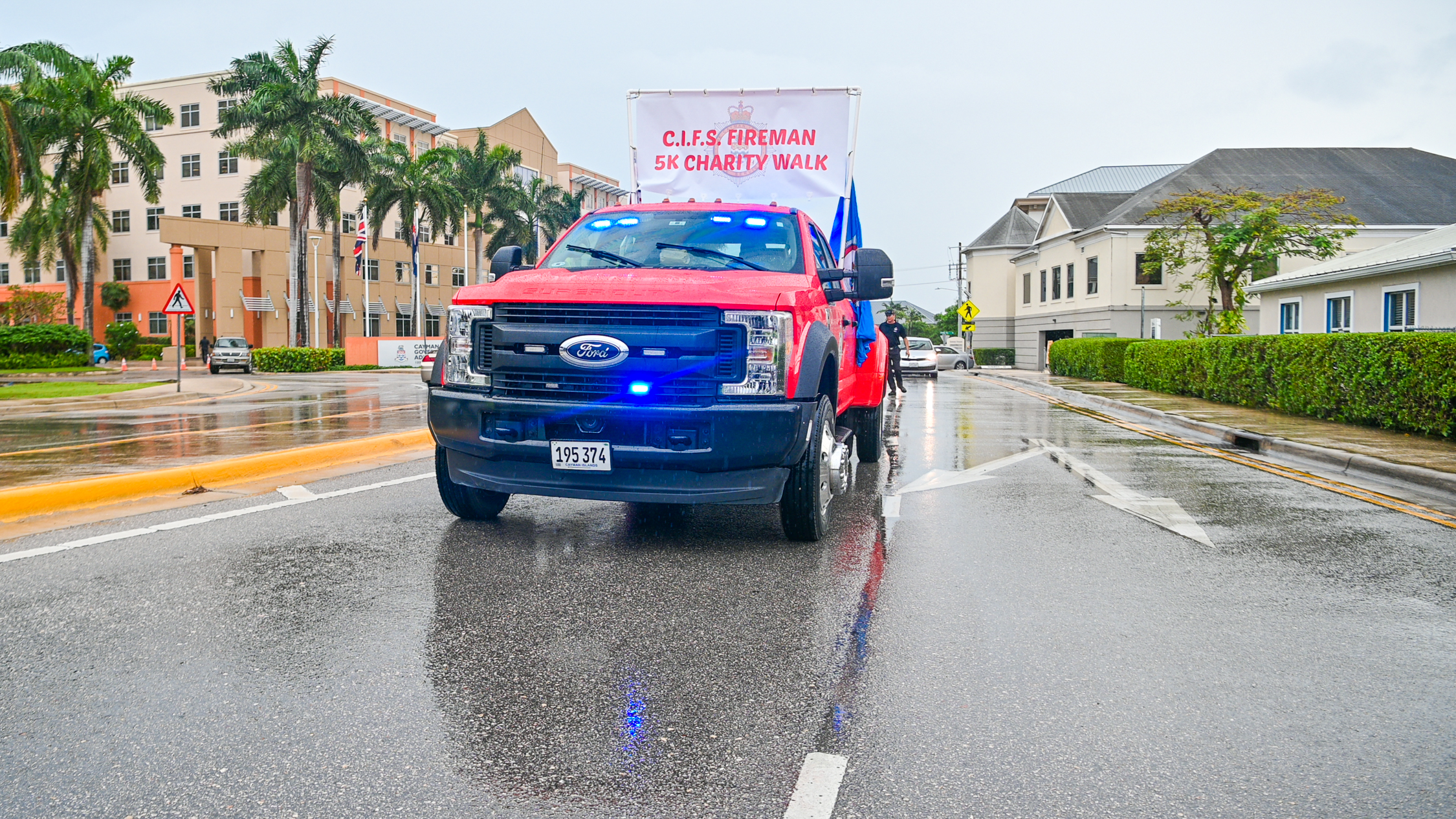 Firemen raise over $5K in inaugural walk - Cayman Compass