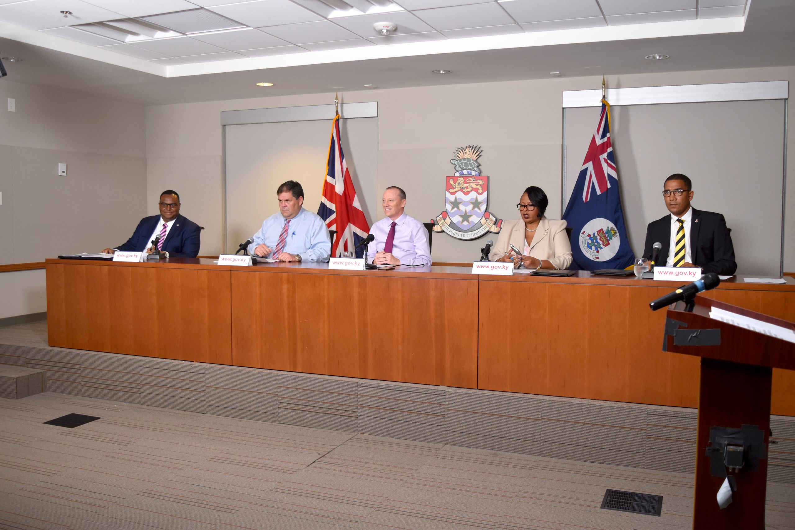 Press conference panel - Cayman Compass