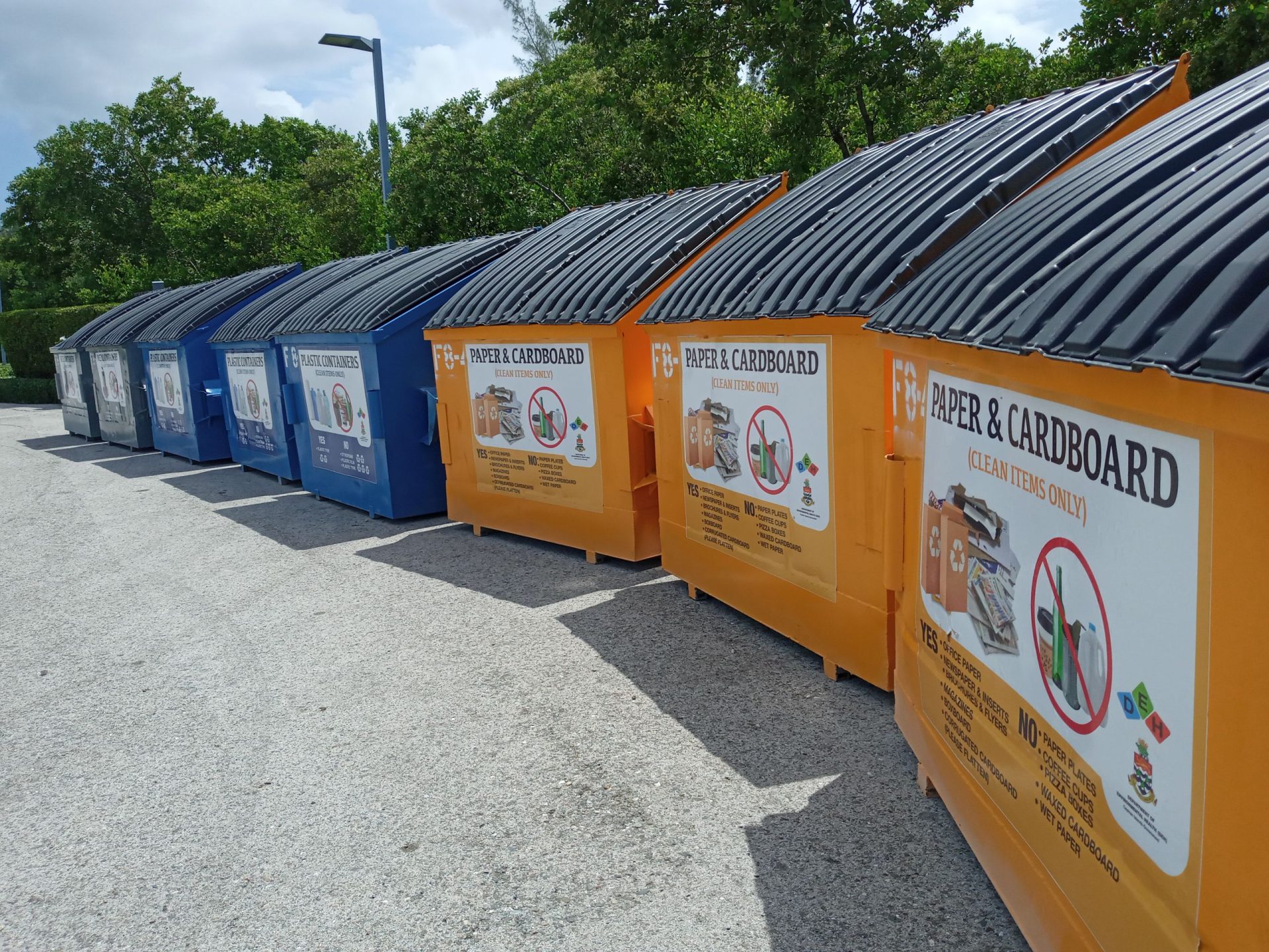 DEH celebrates the opening of a new recycle depot - Cayman Compass