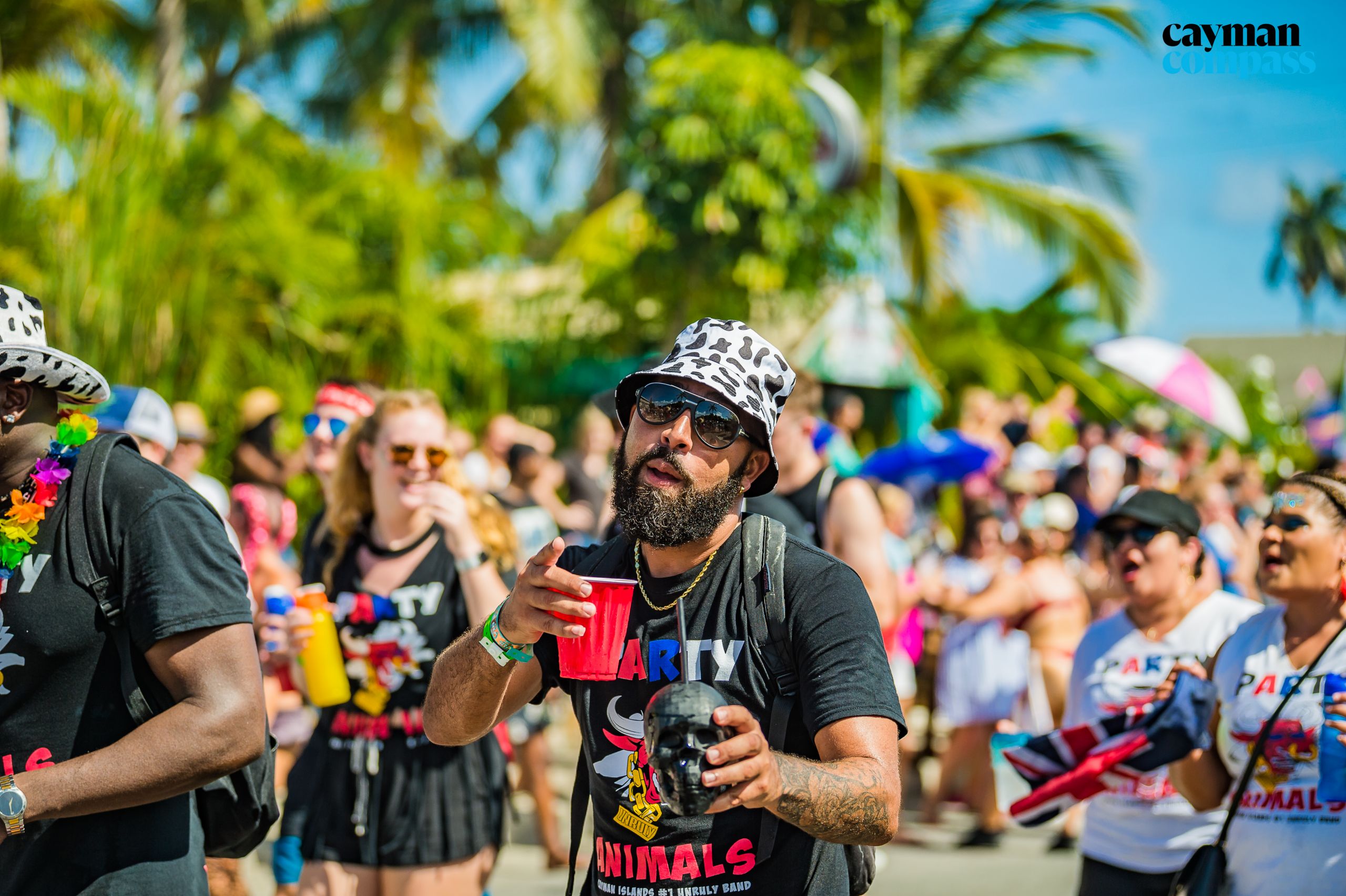 CayMAS braves heat to parade - Cayman Compass