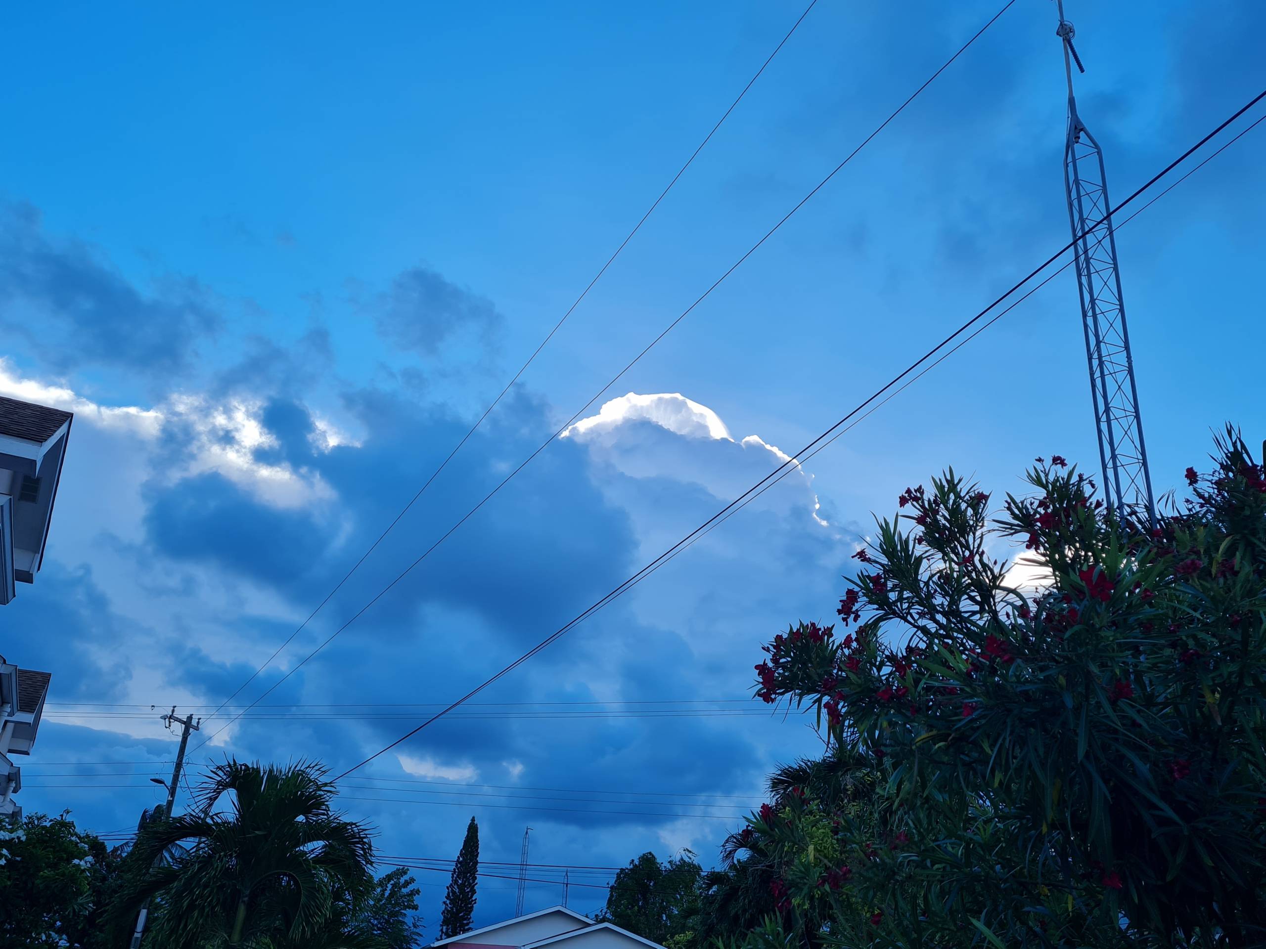 Rough weather brings rainbow cloud - Cayman Compass