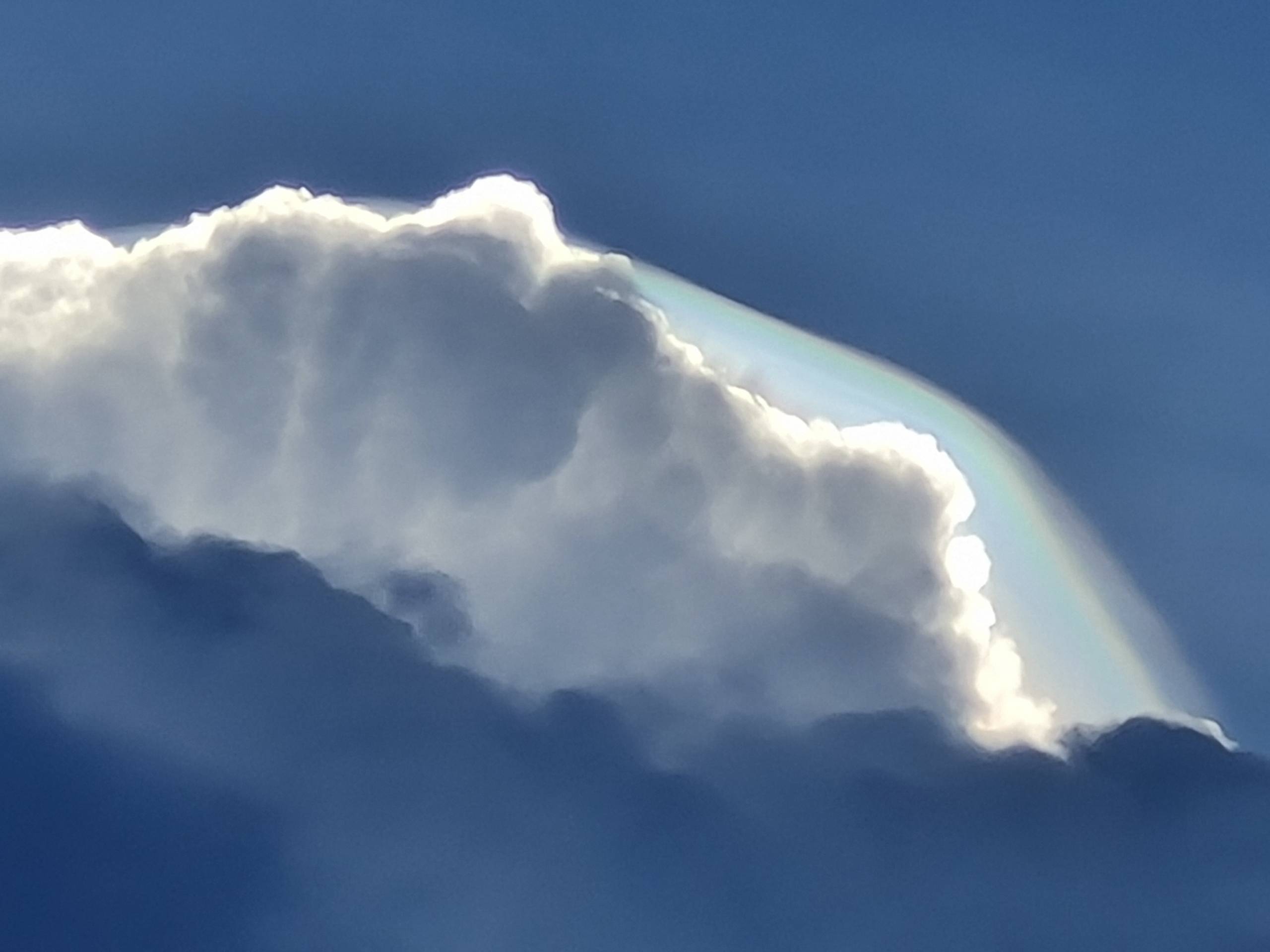 Rough weather brings rainbow cloud - Cayman Compass