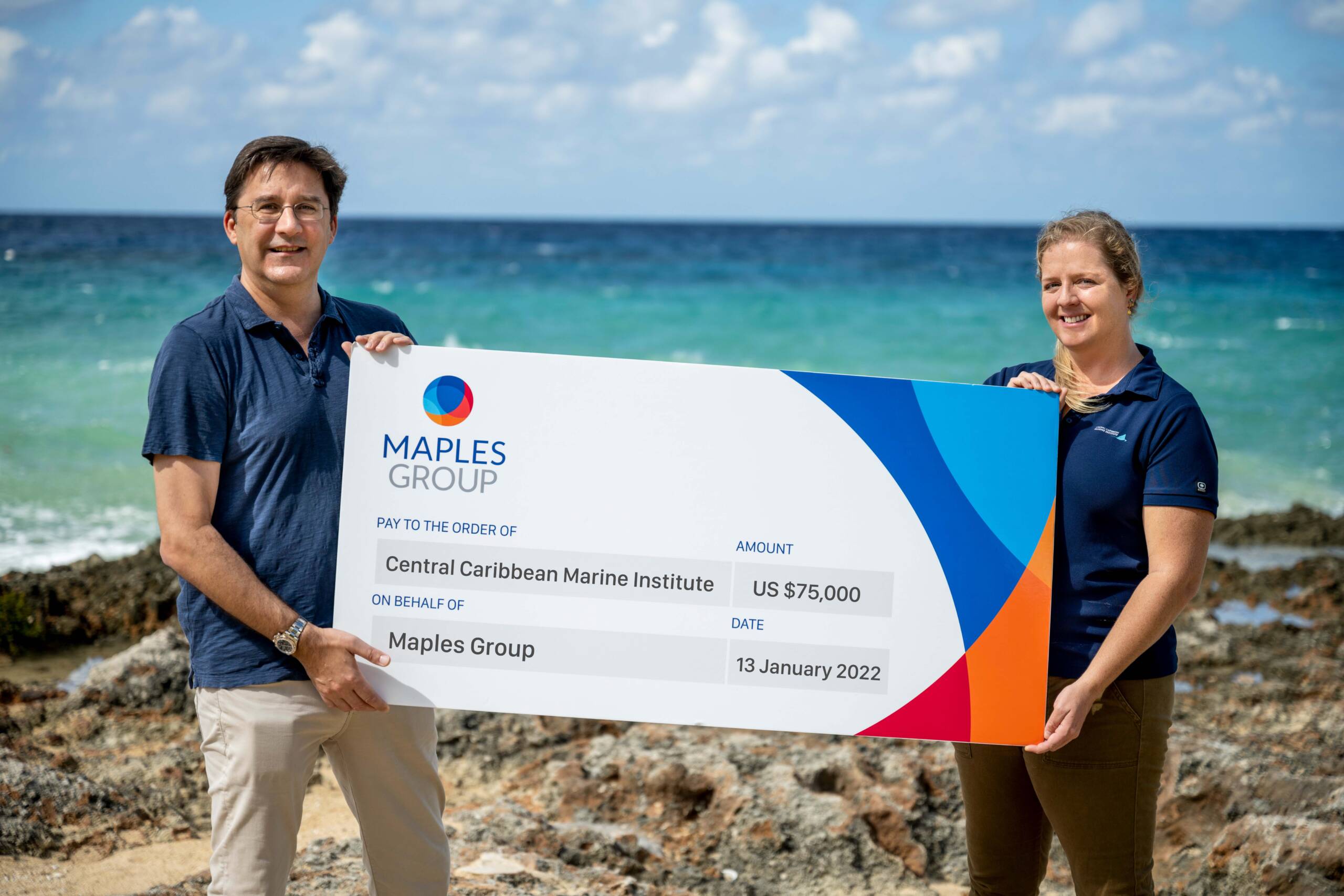CCMI_Cheque_Handover_Photo_v1 - Cayman Compass