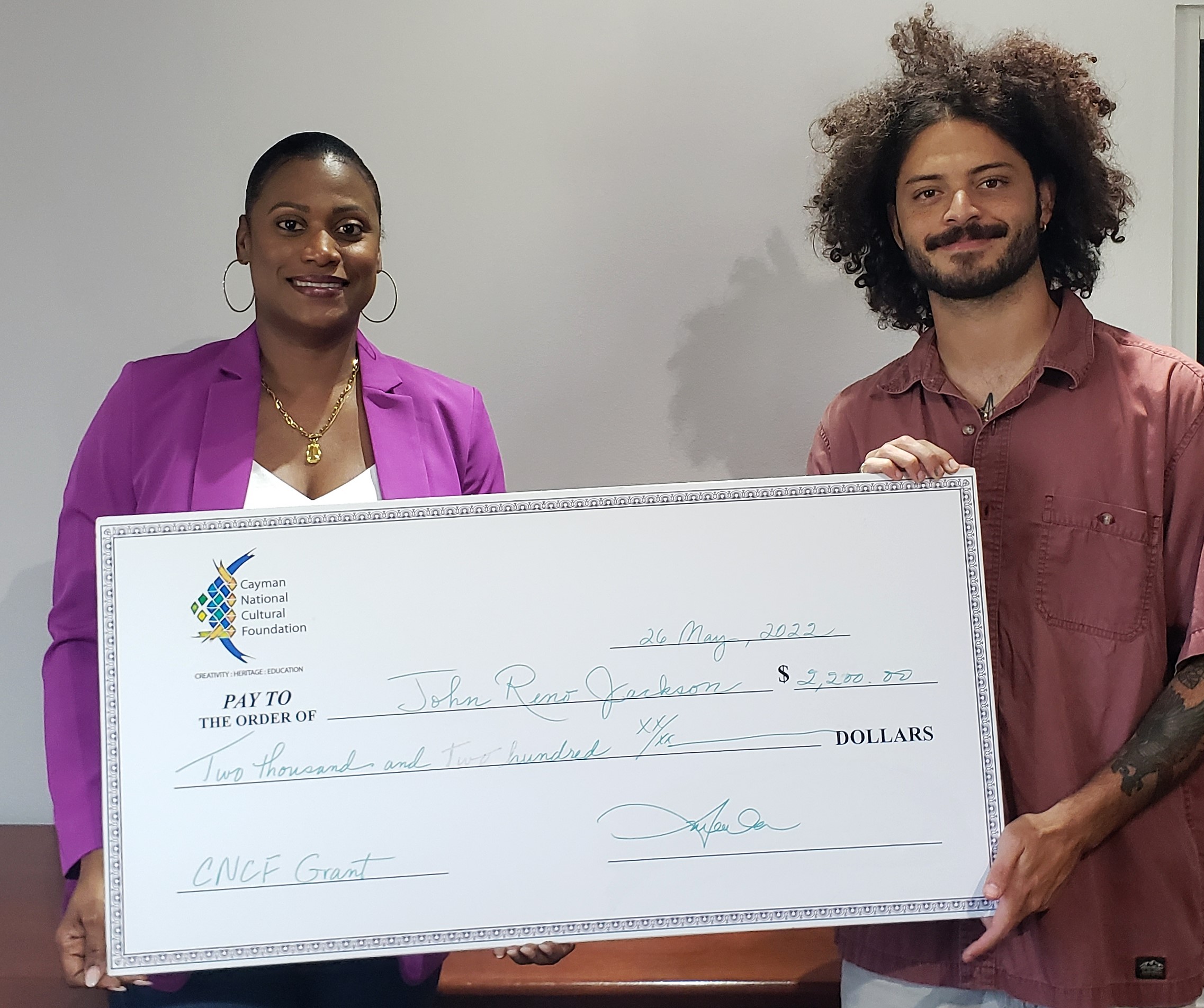 CNCF_Grant_Presentation_John_Reno_Jackson - Cayman Compass