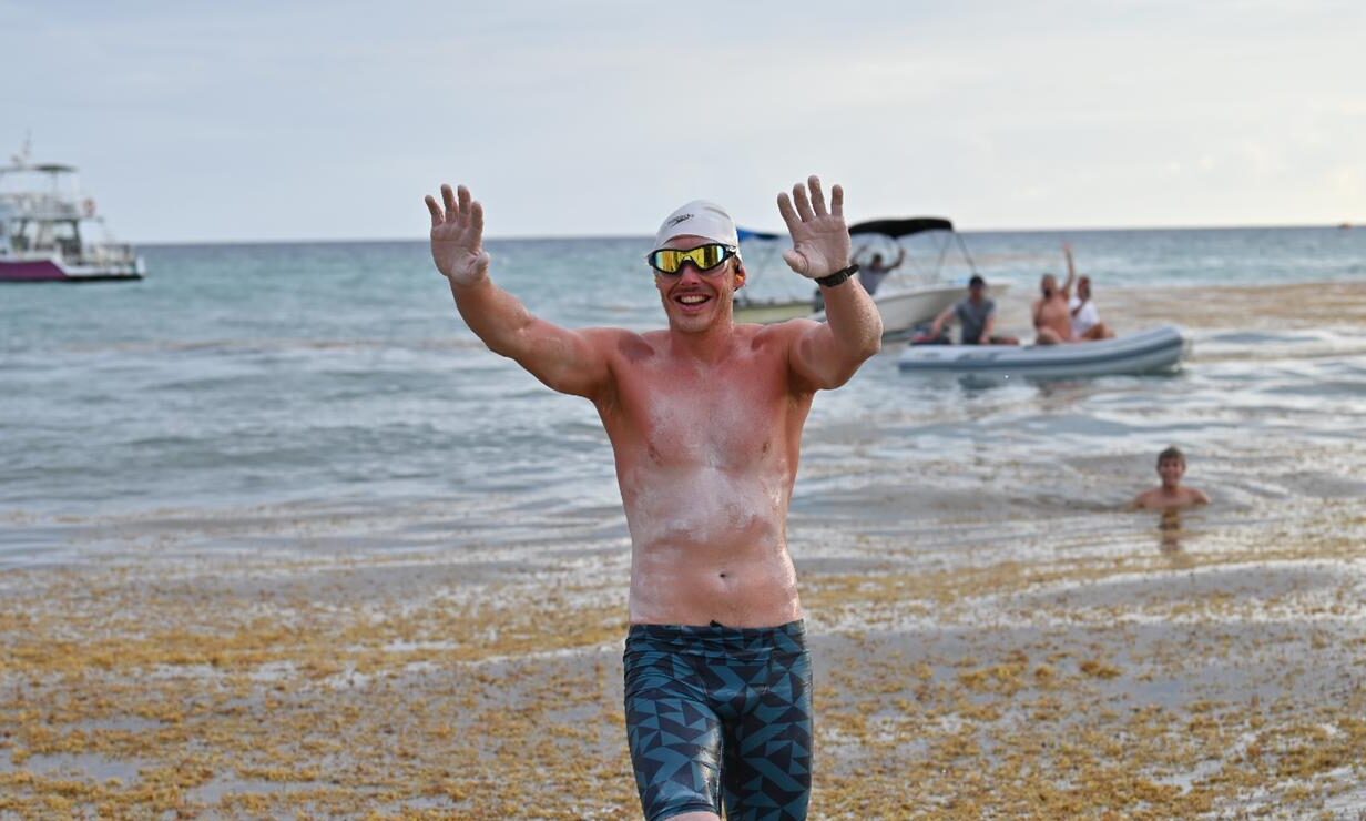 Oly Rush makes world-record book for Grand Cayman swim - Cayman Compass