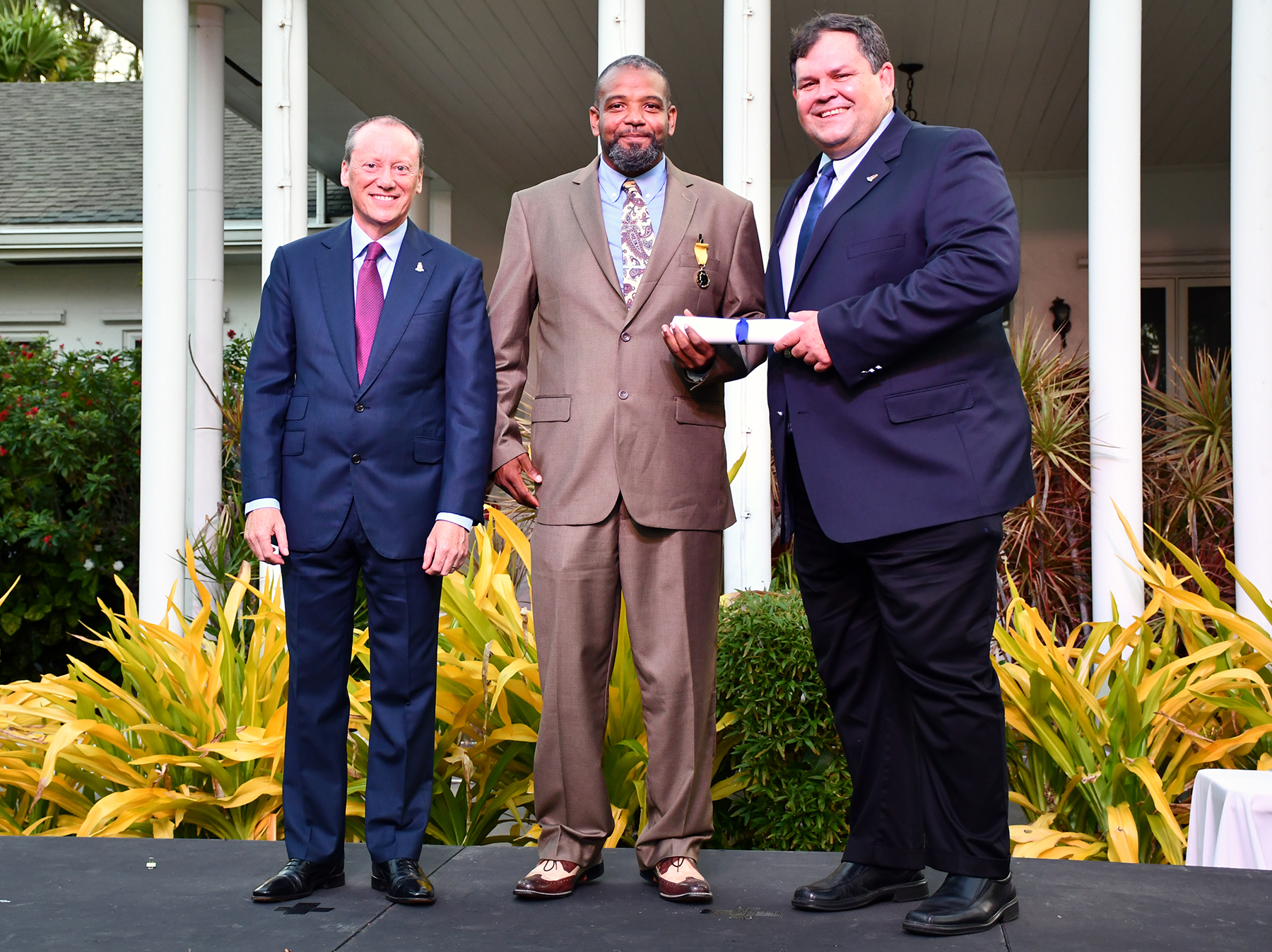 PHOTOS: Recipients of New Year's Honours collect their awards - Cayman ...