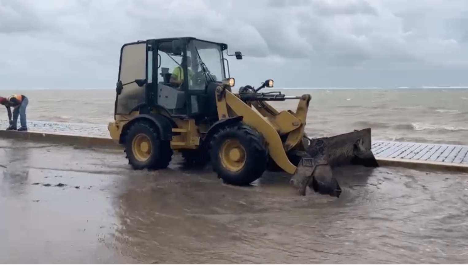 Sund Sound tractor in water - Cayman Compass