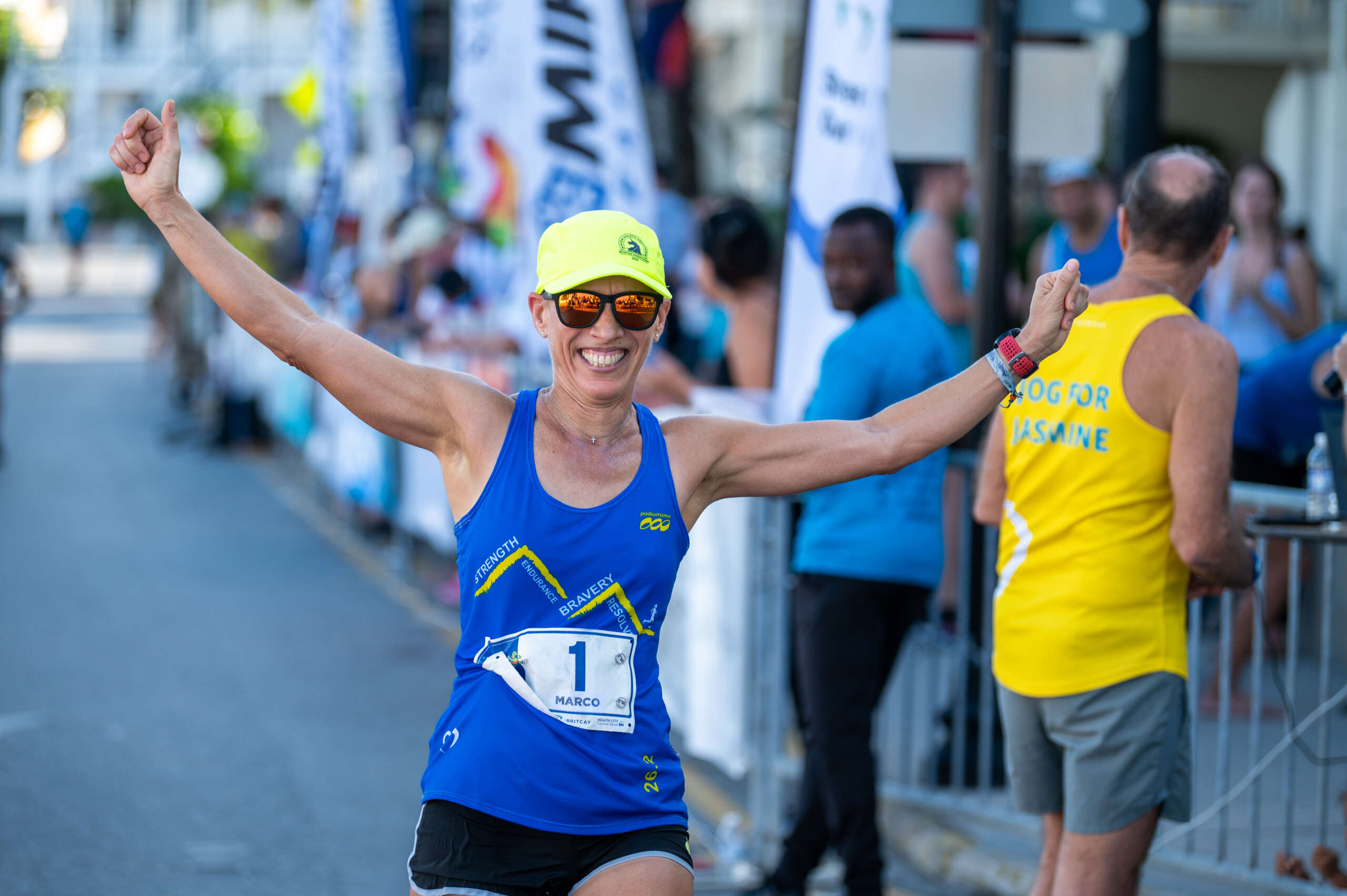 British visitors win Cayman's full and half marathon - Cayman Compass