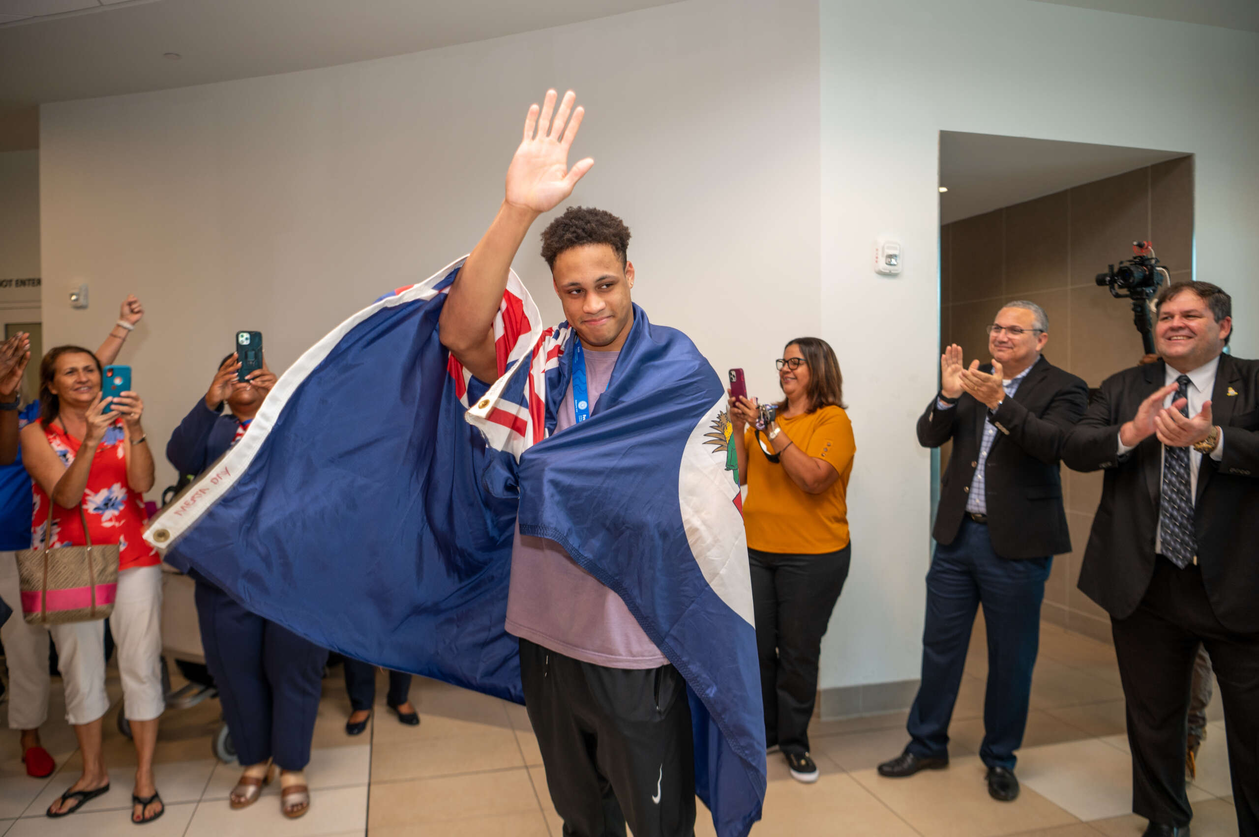 Swimmer Jordan Crooks among 8 receiving New Year honours in Cayman ...