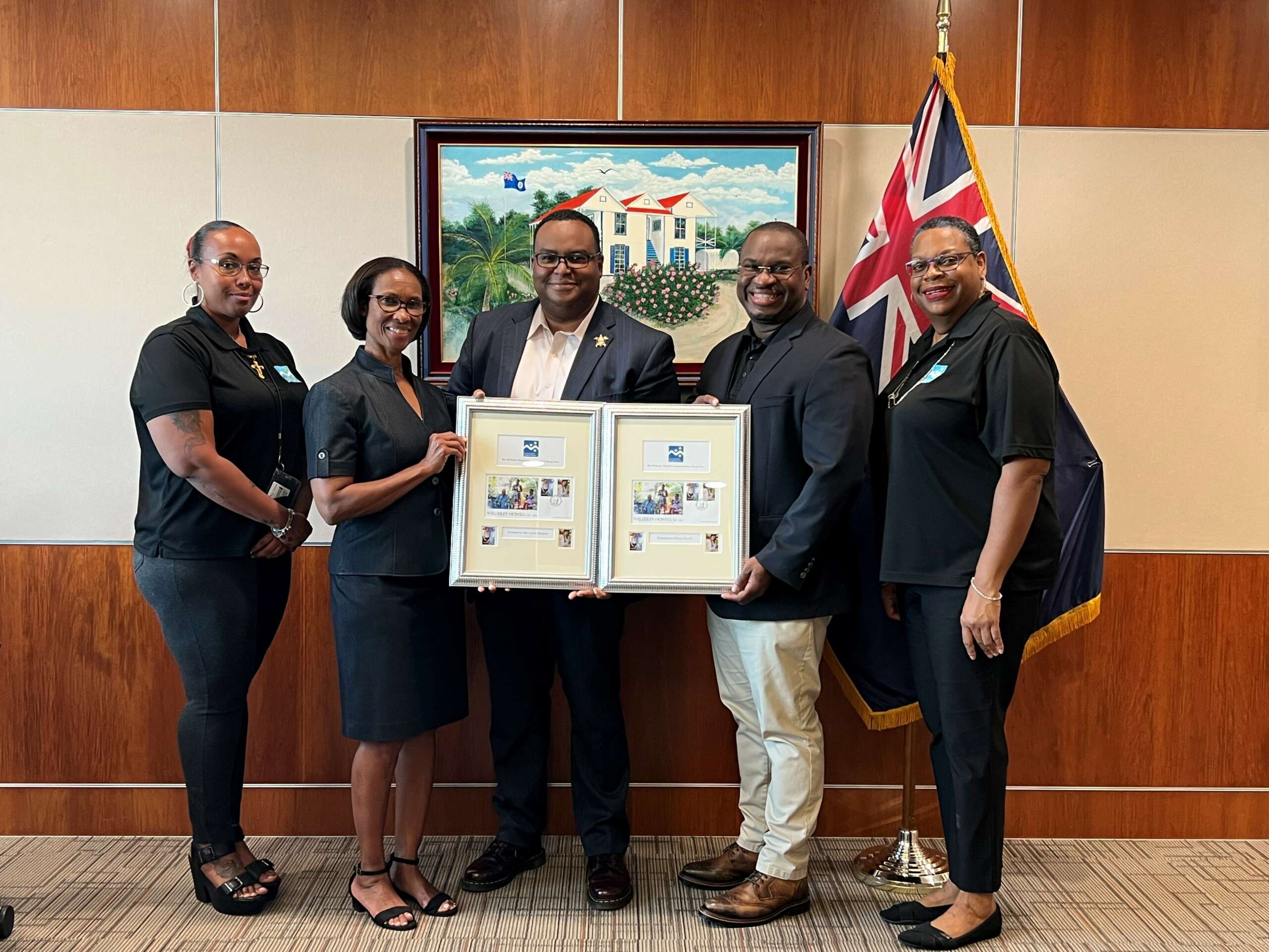 Stamp issue celebrating late centenarian presented to his children ...